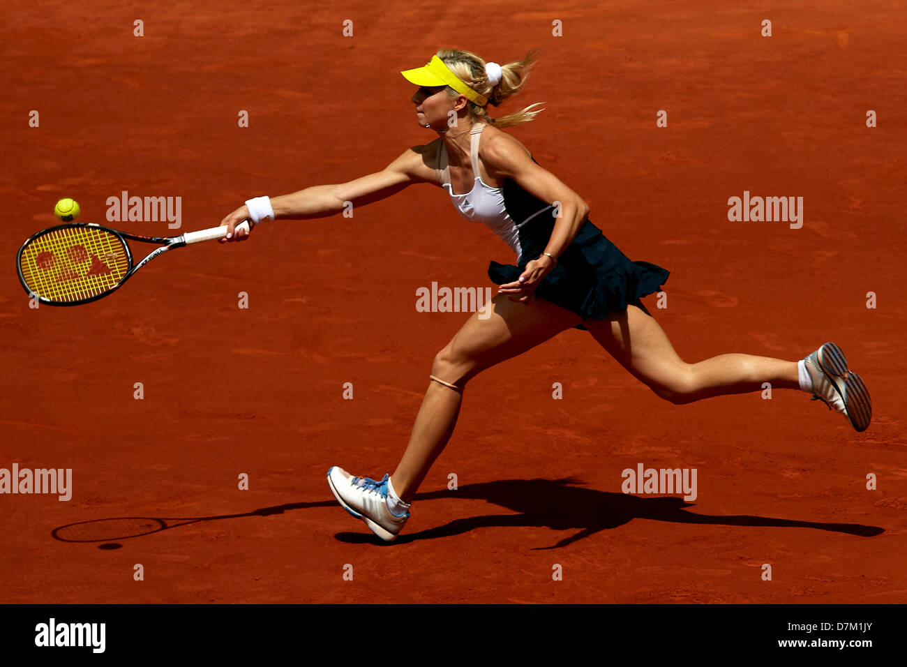Madrid, Spain. 9th May 2013. Maria Kirilenko of Russia stretches to ...