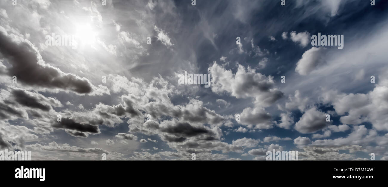 Panoramic sky with grey clouds and sun rays Stock Photo - Alamy