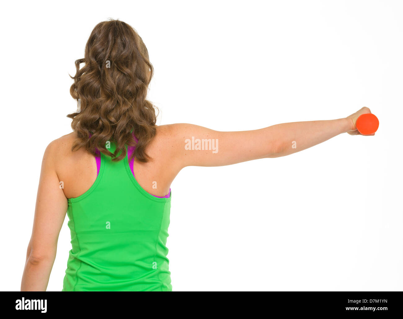 Healthy woman making exercise with dumbbells . rear view Stock Photo ...
