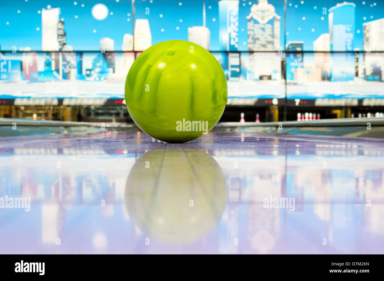 Green sphere ball standing on bowling lane before strike Stock Photo ...
