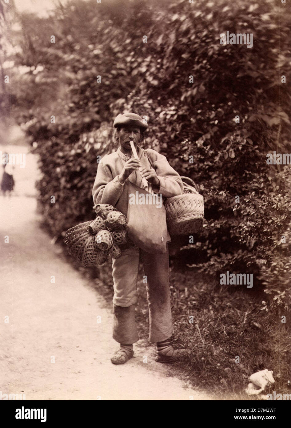 An 1880s photograph by Carl Curman depicting a flute player in Lysekil ...