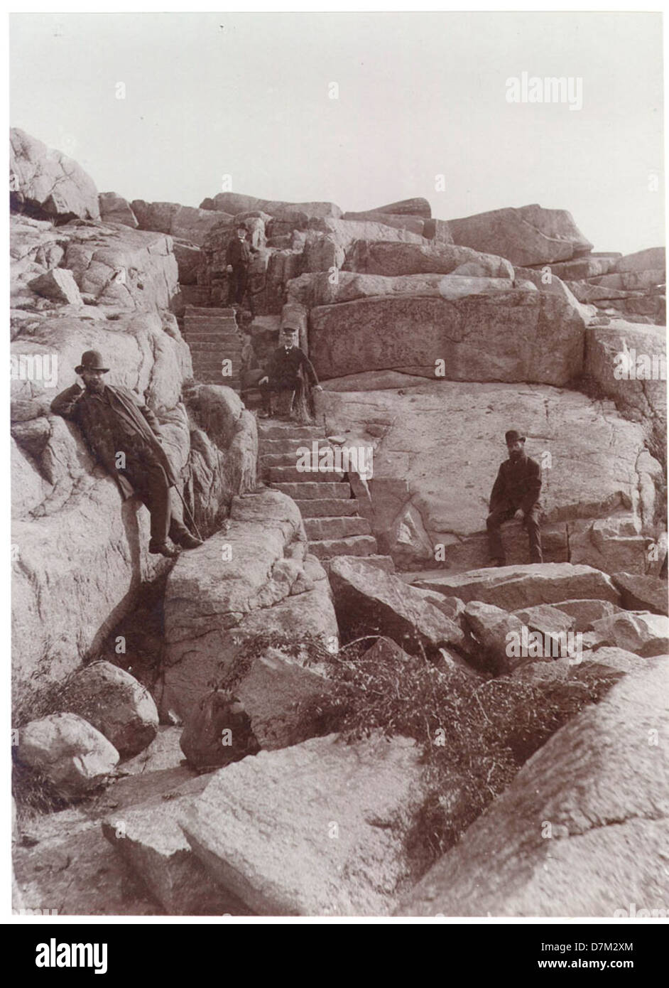 This photograph shows men in hats at Stängehuvud, Lysekil, Sweden ...