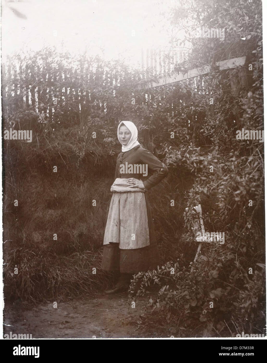 A portrait of a Frisian girl from the island of Sylt, Germany, wearing ...
