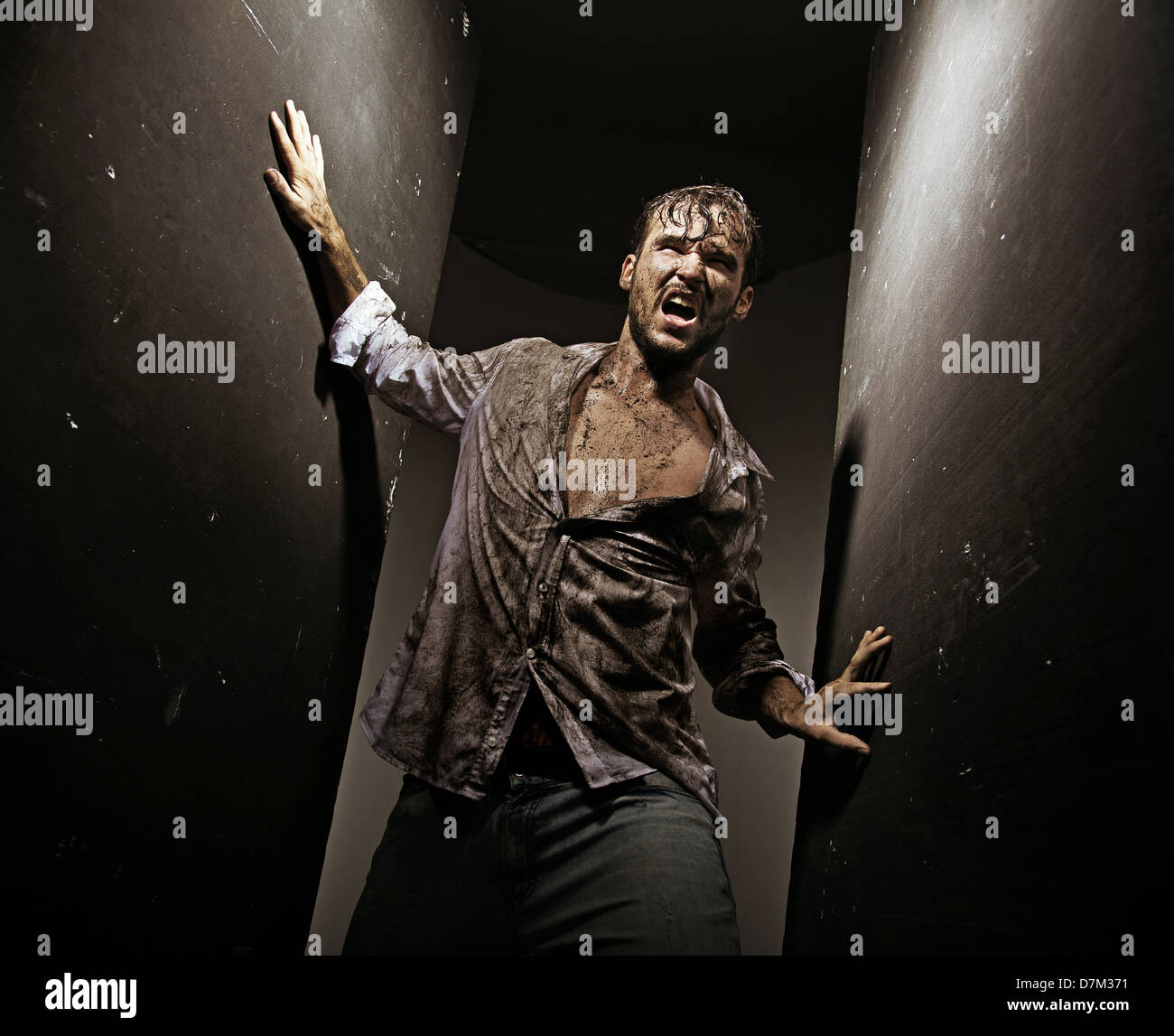 Wounded guy after hard survival Stock Photo - Alamy