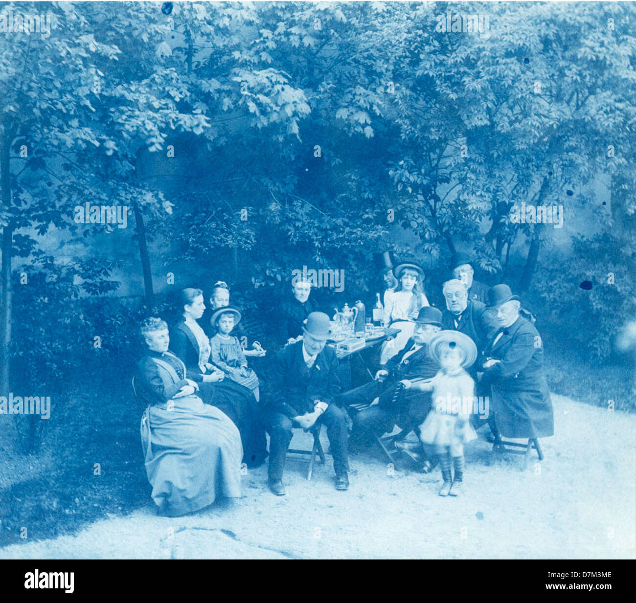 This photograph from Lysekil, Sweden, features people in a garden, with ...