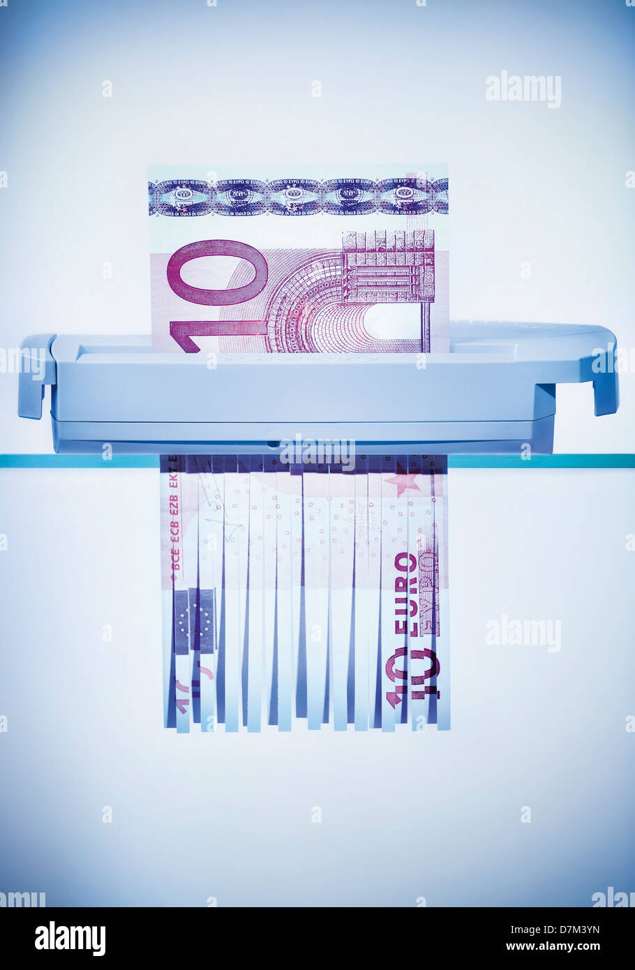 10 euro note in shredder, close up Stock Photo - Alamy