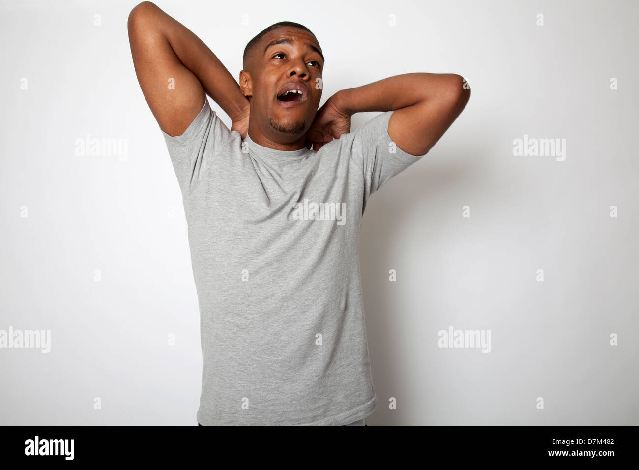 Black British Male Yawning Stock Photo - Alamy