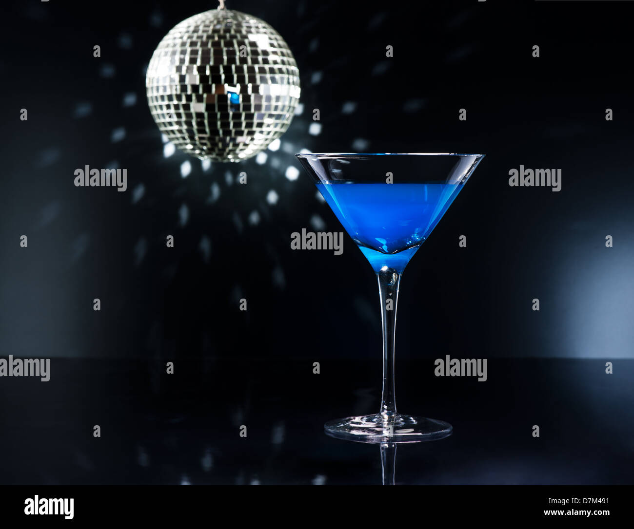 Blue Martini cocktail in an disco setting Stock Photo - Alamy