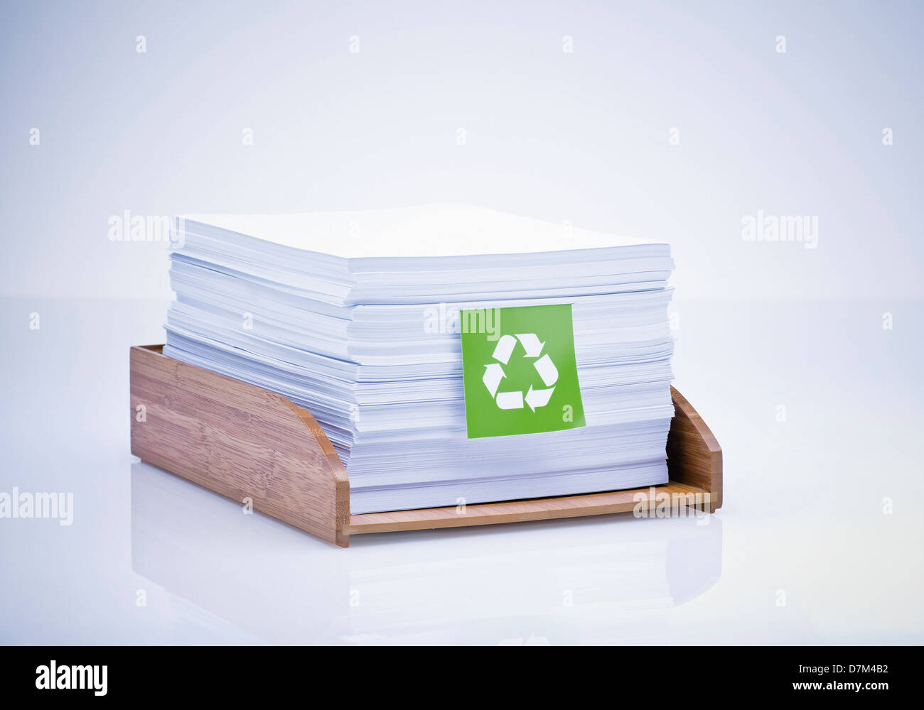 Recycling symbol on paper Stock Photo - Alamy