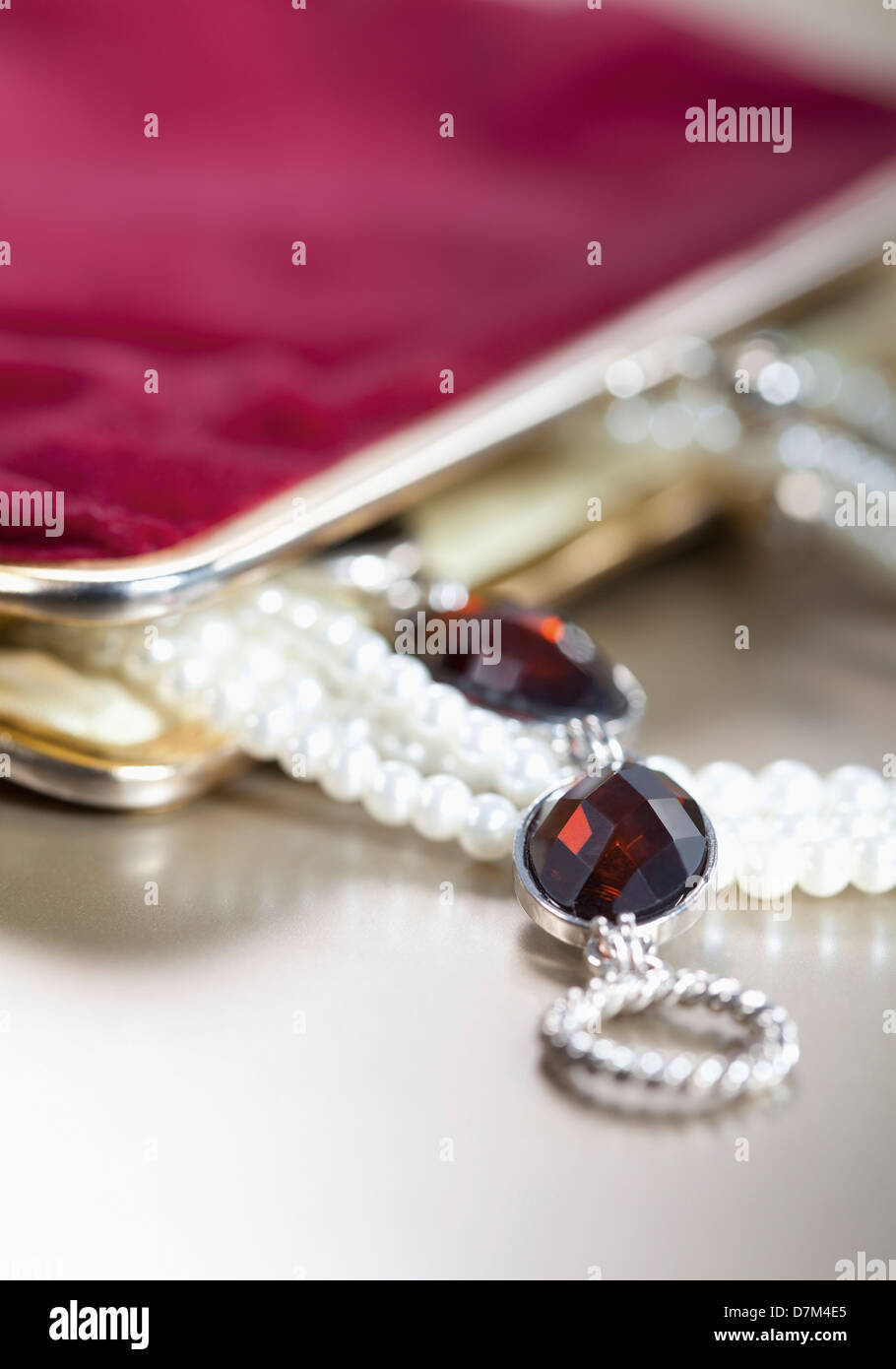 Purse with jewellery, close up Stock Photo - Alamy