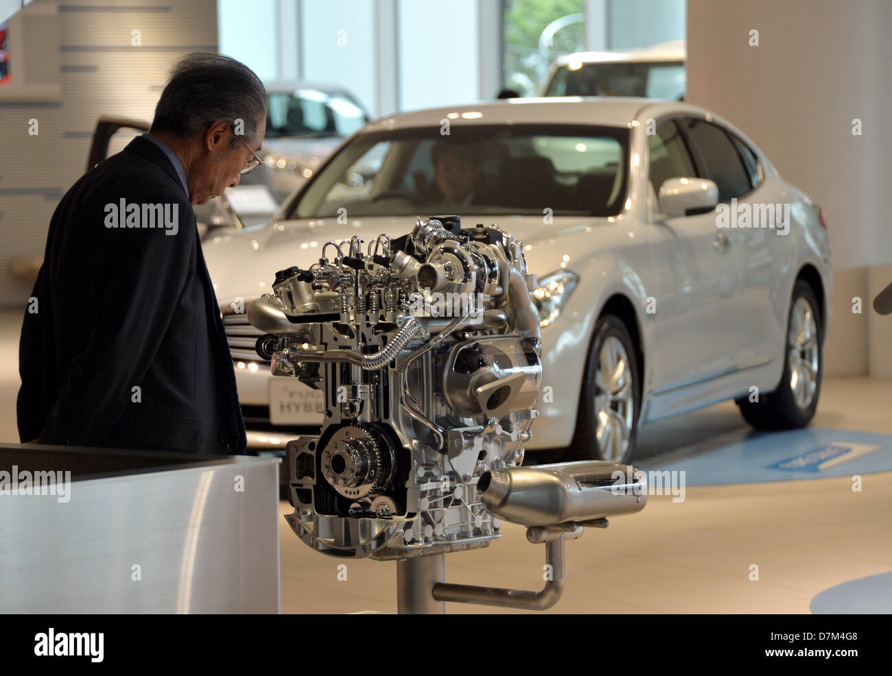 May 10, 2013, Yokohama, Japan - A visitor takes a close look at an ...