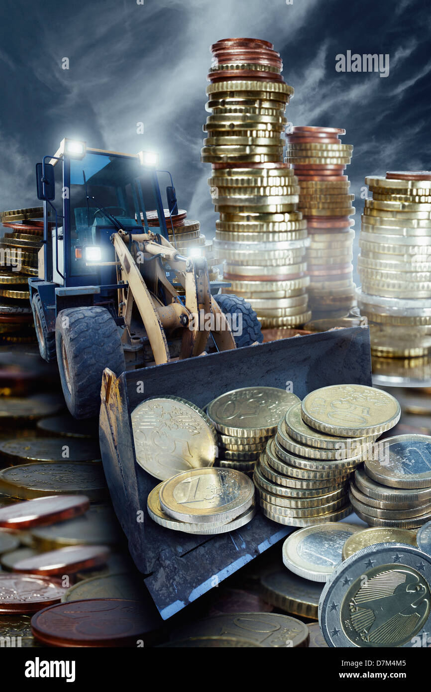 Excavator with Euro coins Stock Photo - Alamy