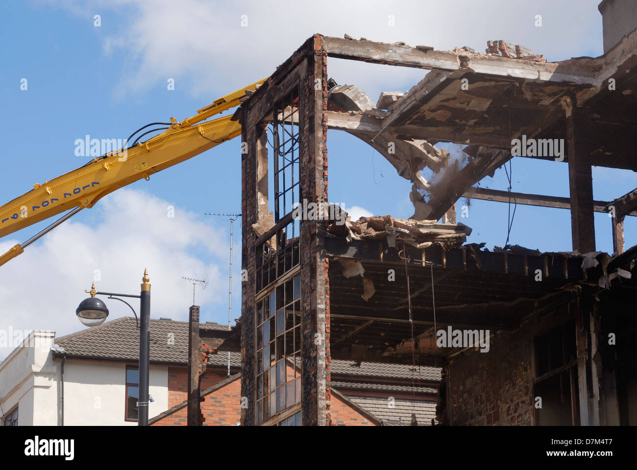 Demolition of a building damaged by fire in Oldham Street, Manchester ...