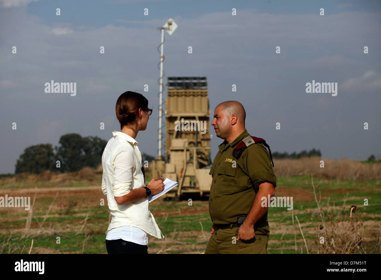 A German reporter interviews Major Aryeh Shalikar, a spokesman for the ...