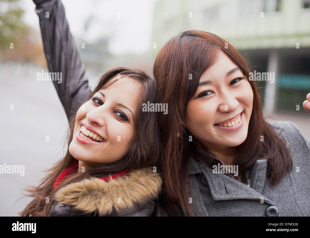 Germany, Portrait of young women, smiling Stock Photo - Alamy