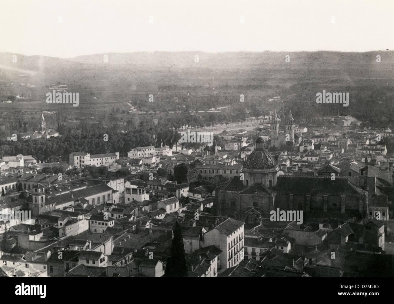 This albumen print captures a historic view of Granada, Spain. The ...