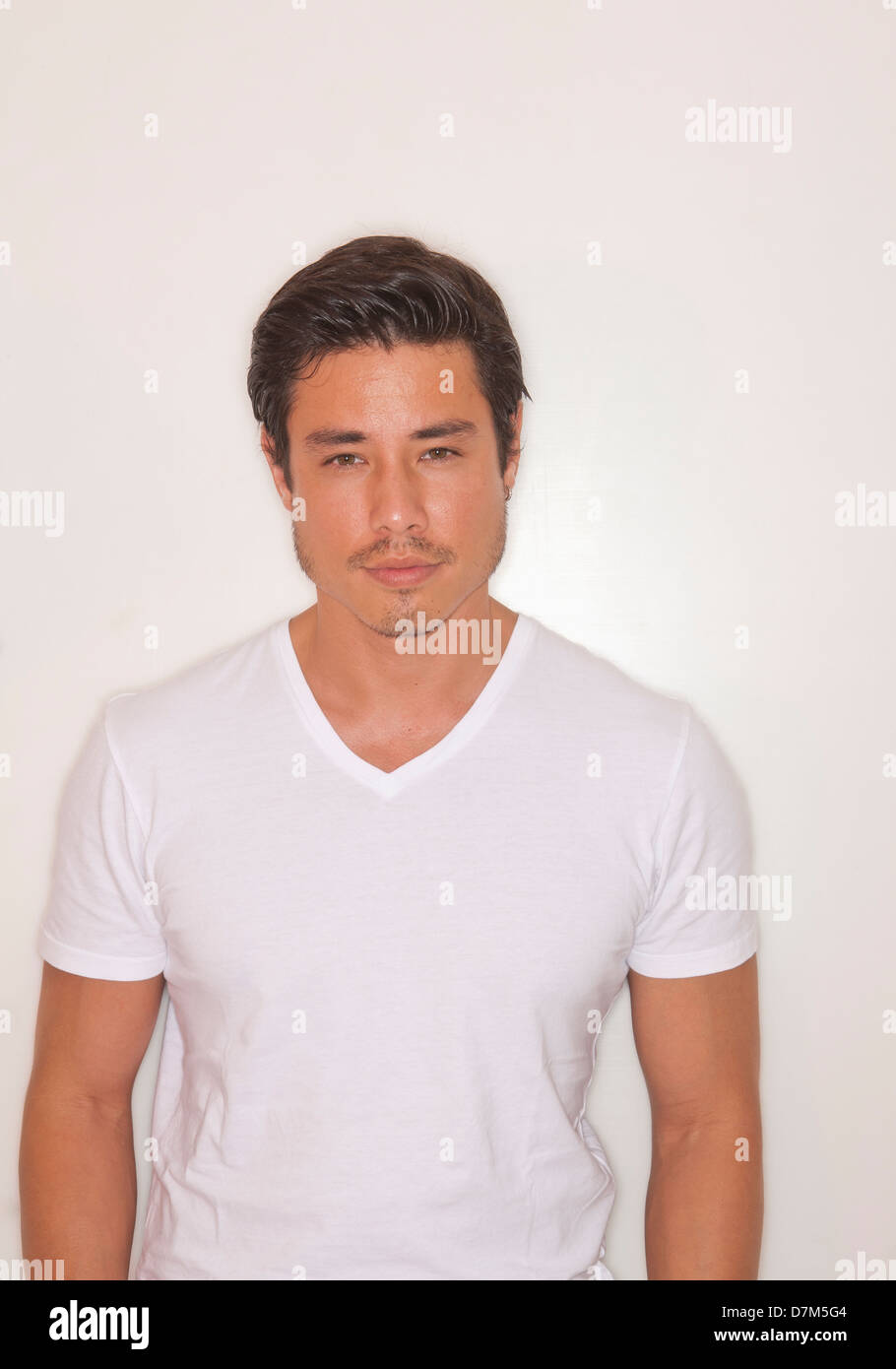 Man up against white hi-res stock photography and images - Alamy