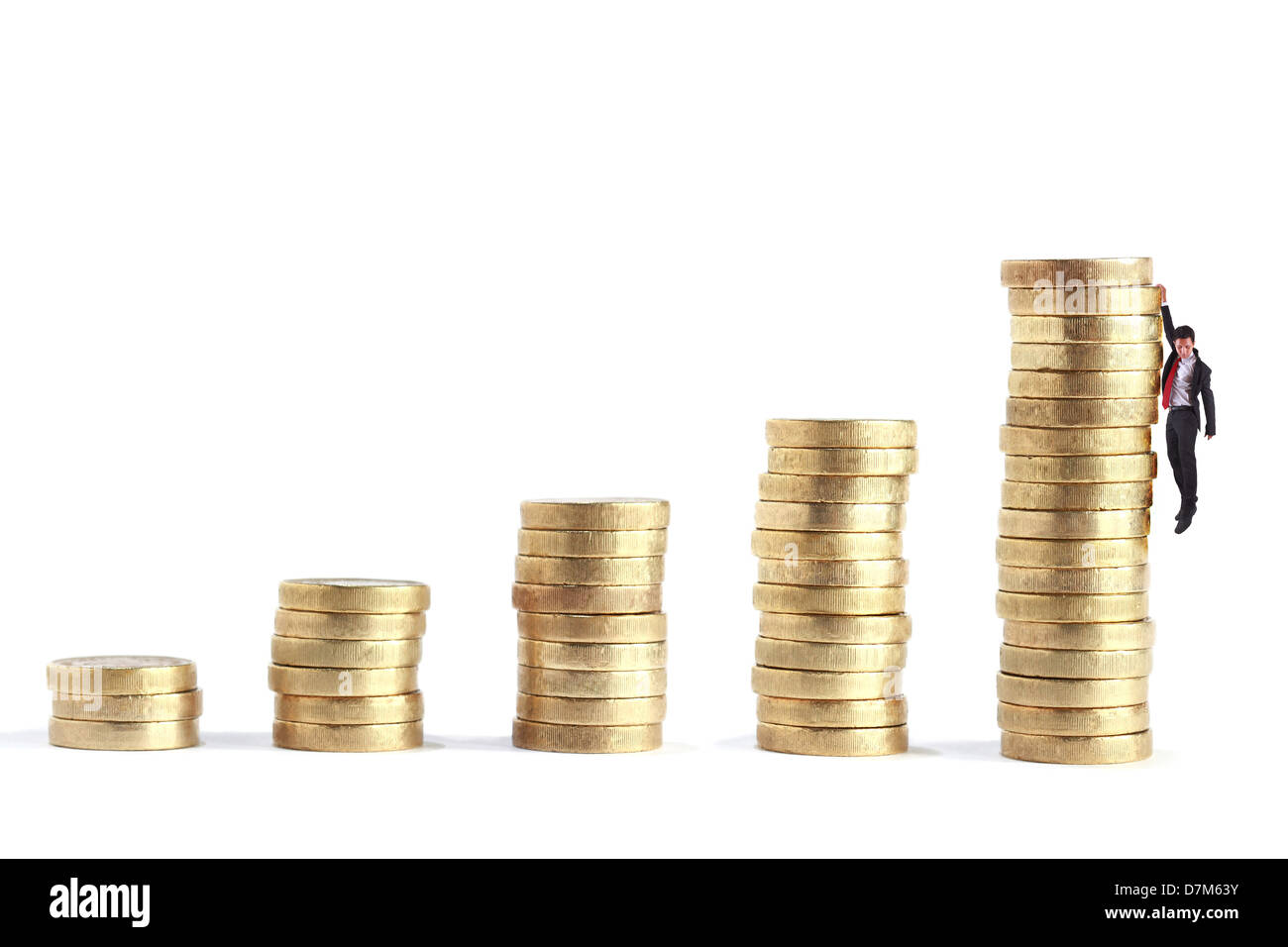 gold coin stack arrange growing up on white background Stock Photo - Alamy