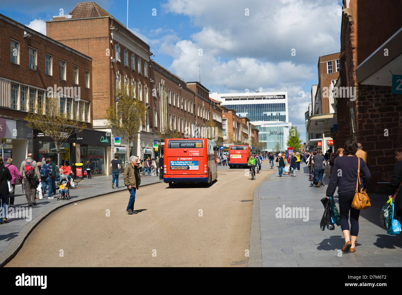 Shoppers on busy high street in Exeter Devon England UK Stock Photo - Alamy