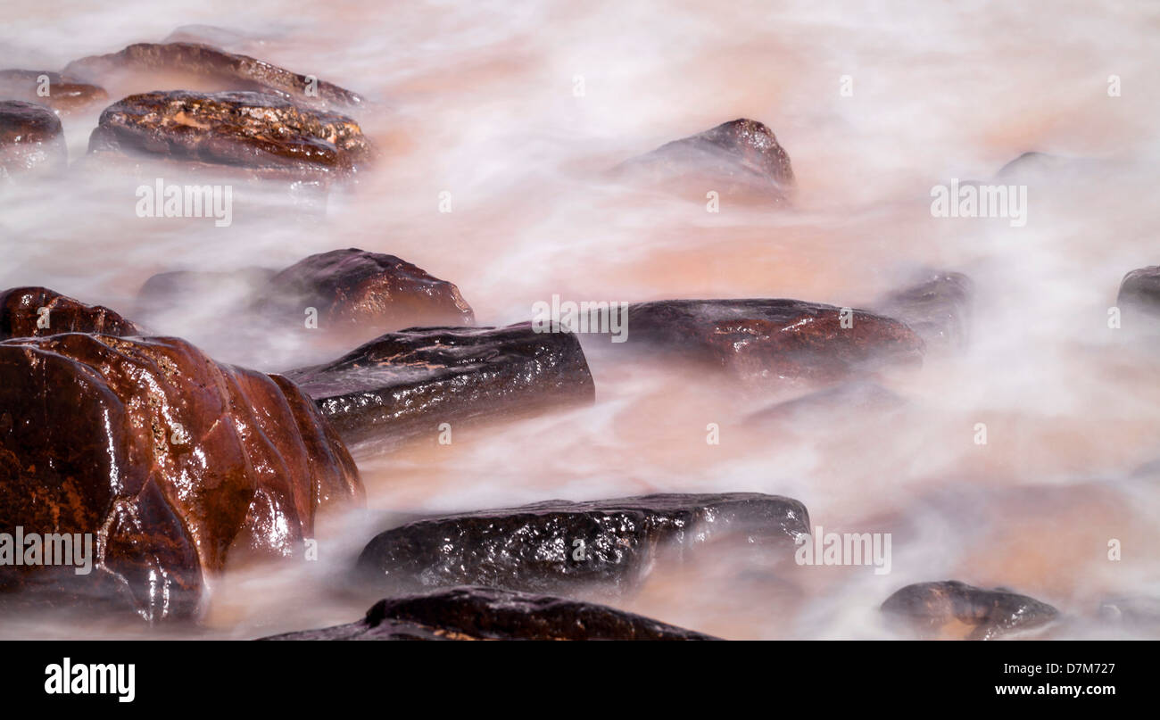 Portugal, Stones with floating water Stock Photo - Alamy