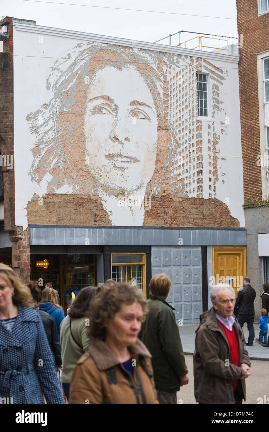 Hacked off render creating graffiti artwork on busy high street in ...