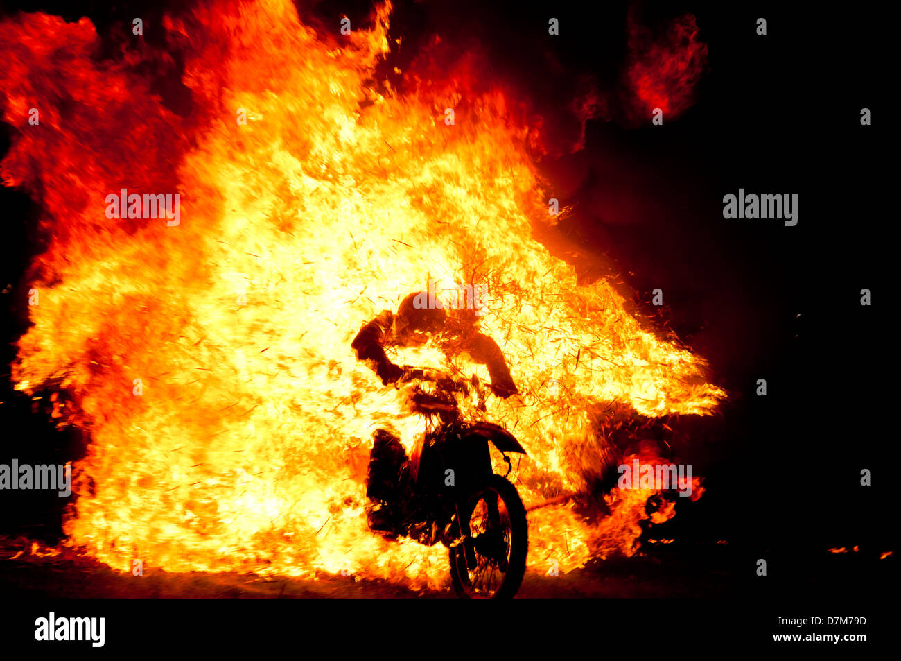 Stuntwoman driving through wall of fire Stock Photo - Alamy