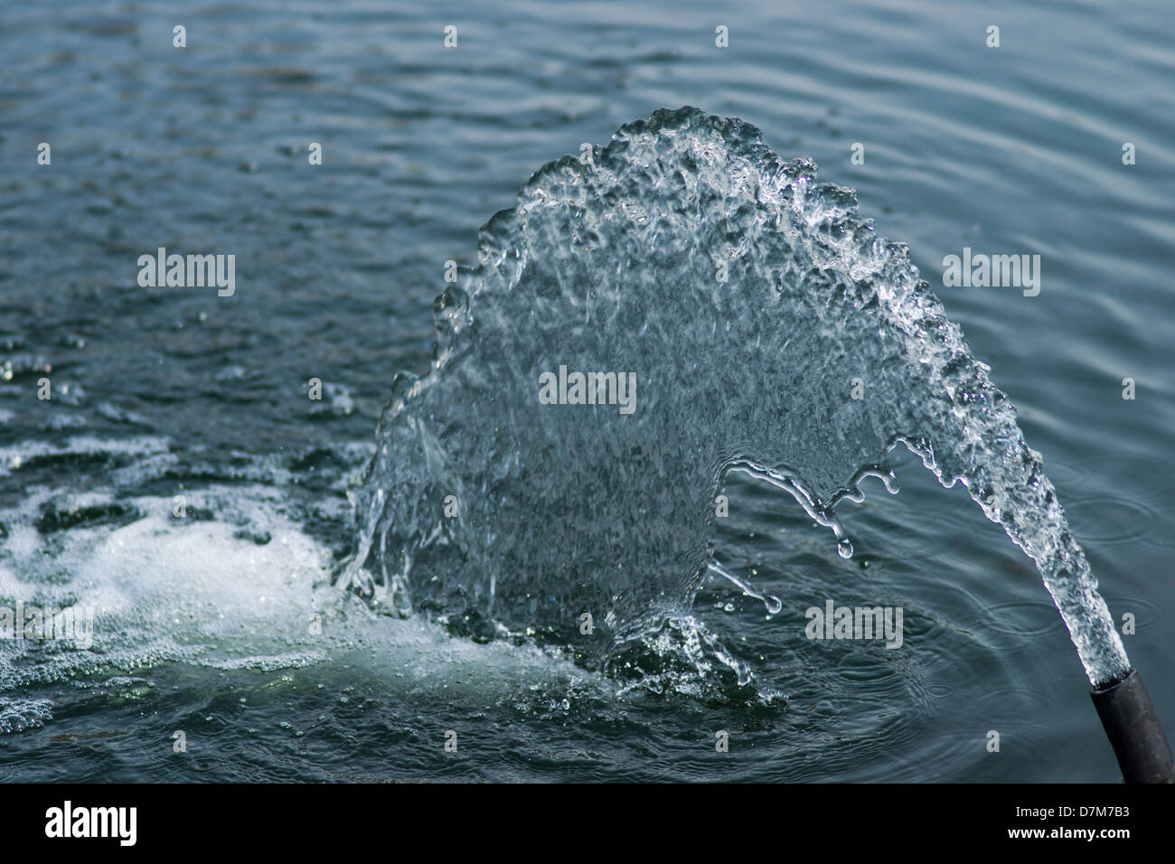 Jet of water from a hose Stock Photo - Alamy