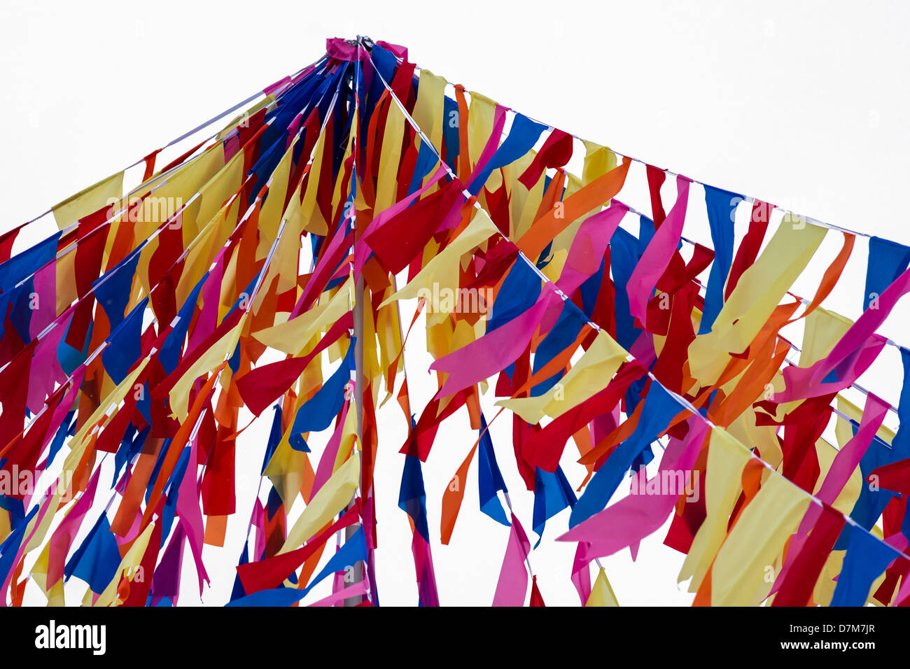 Cone of colorful flags fixed to ropes, isolated Stock Photo - Alamy