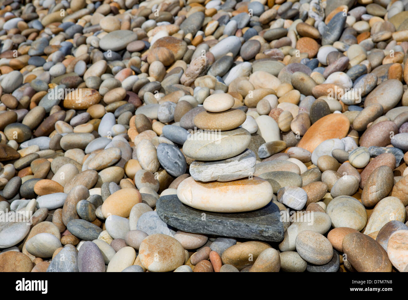 colorful pebble stone background, at the beach Stock Photo - Alamy