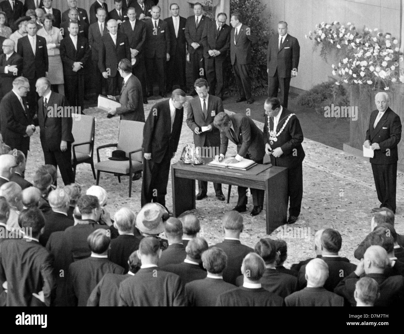 John F. Kennedy signs the Golden Book of the city of Cologne on the ...