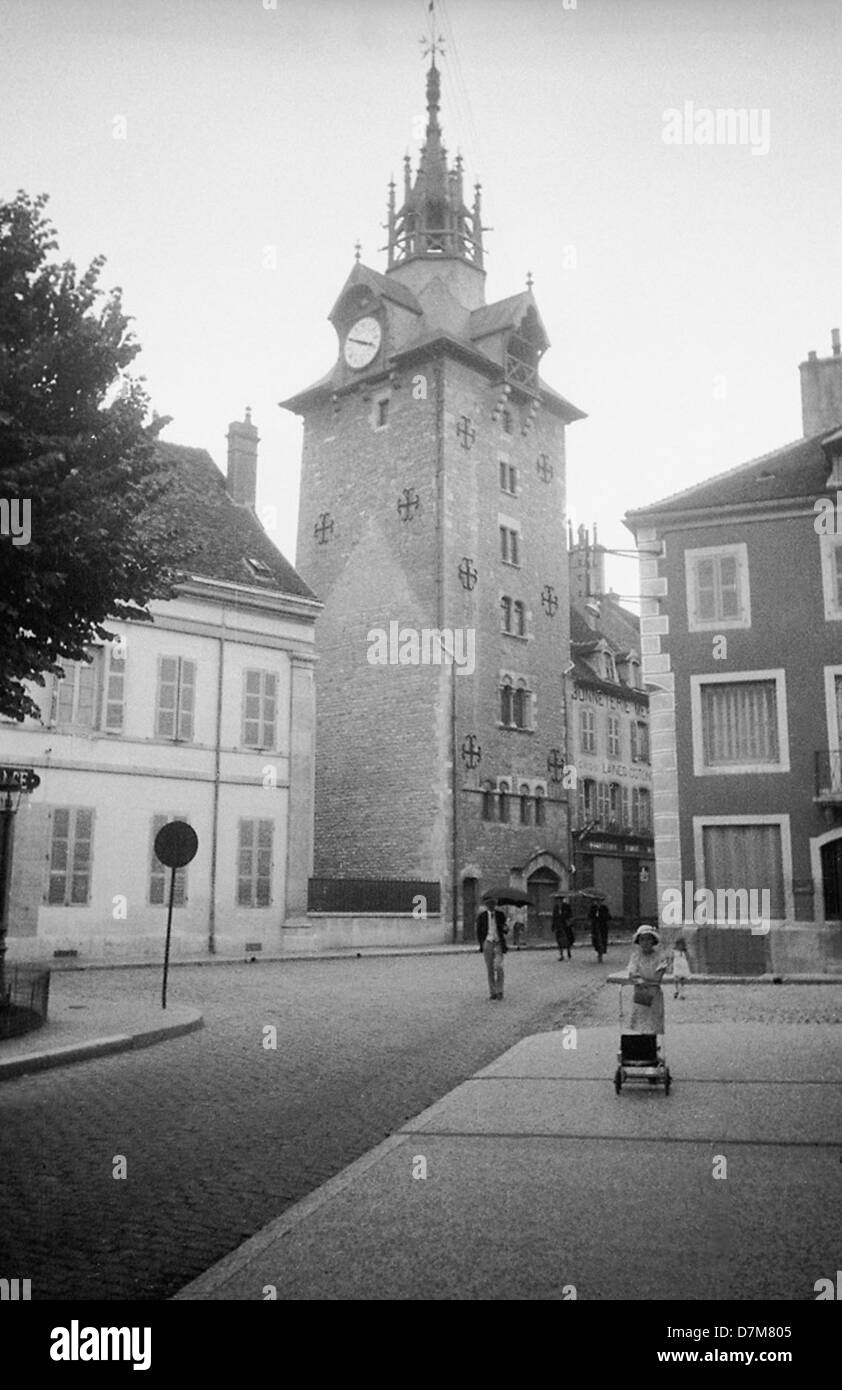 This black and white photo captures a street view in Beaune, France ...