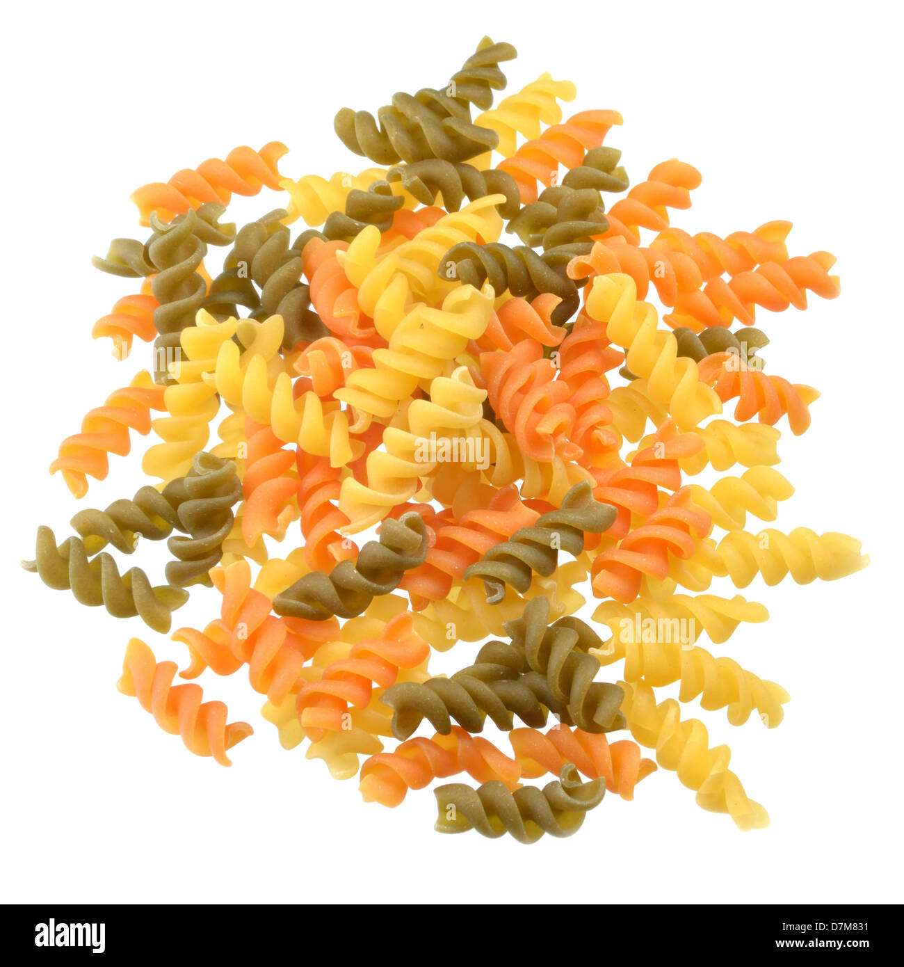 Tricolor Pasta fusilli pile isolated over white background Stock Photo ...