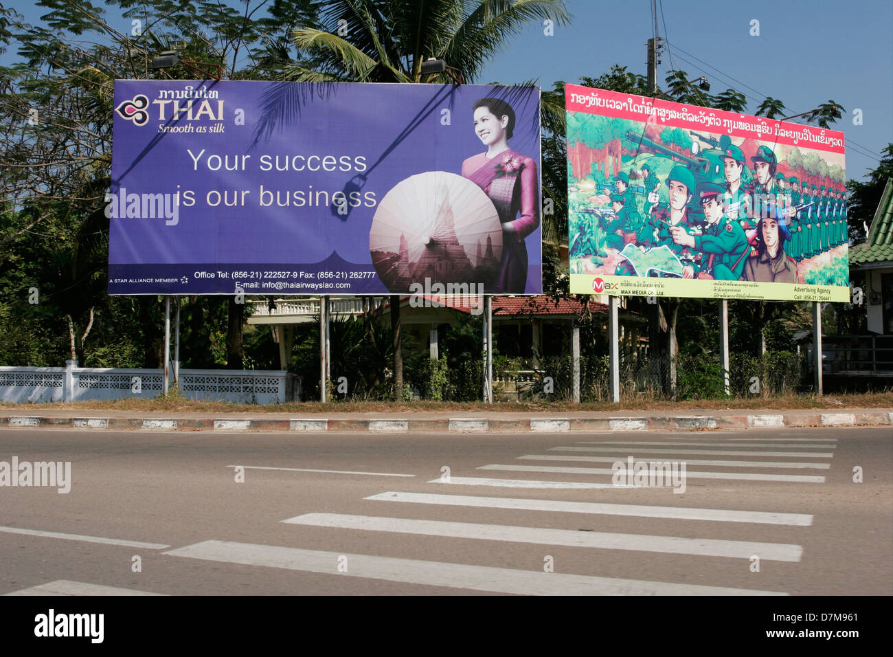 Billboards for Thai Airways and the laotian military grace billboards ...