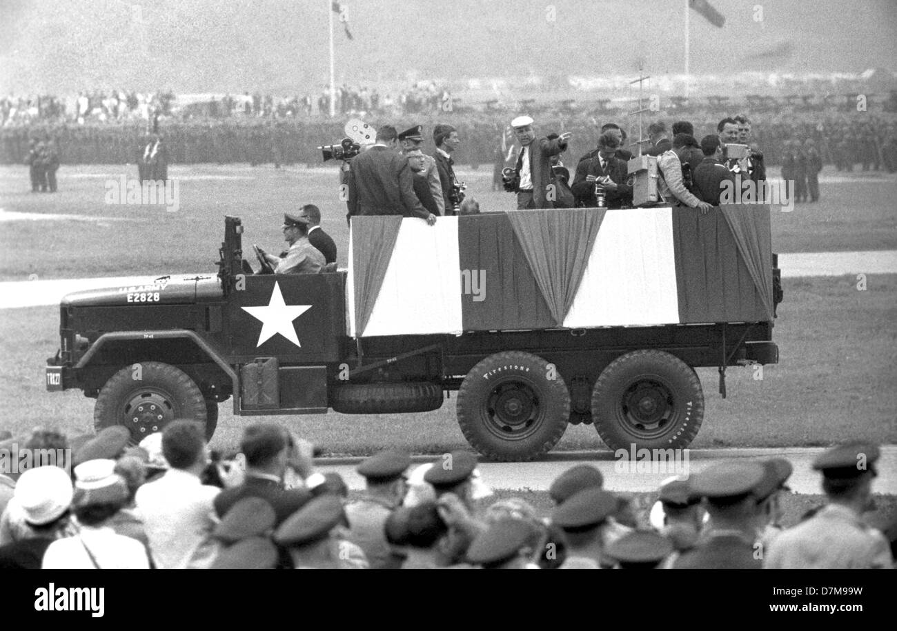 Media on a military vehicle. US president John F. Kennedy visited the ...