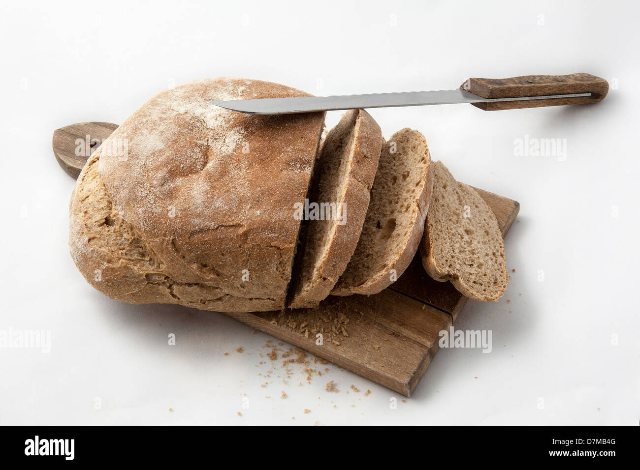 Sliced bread on the wooden desk Stock Photo - Alamy