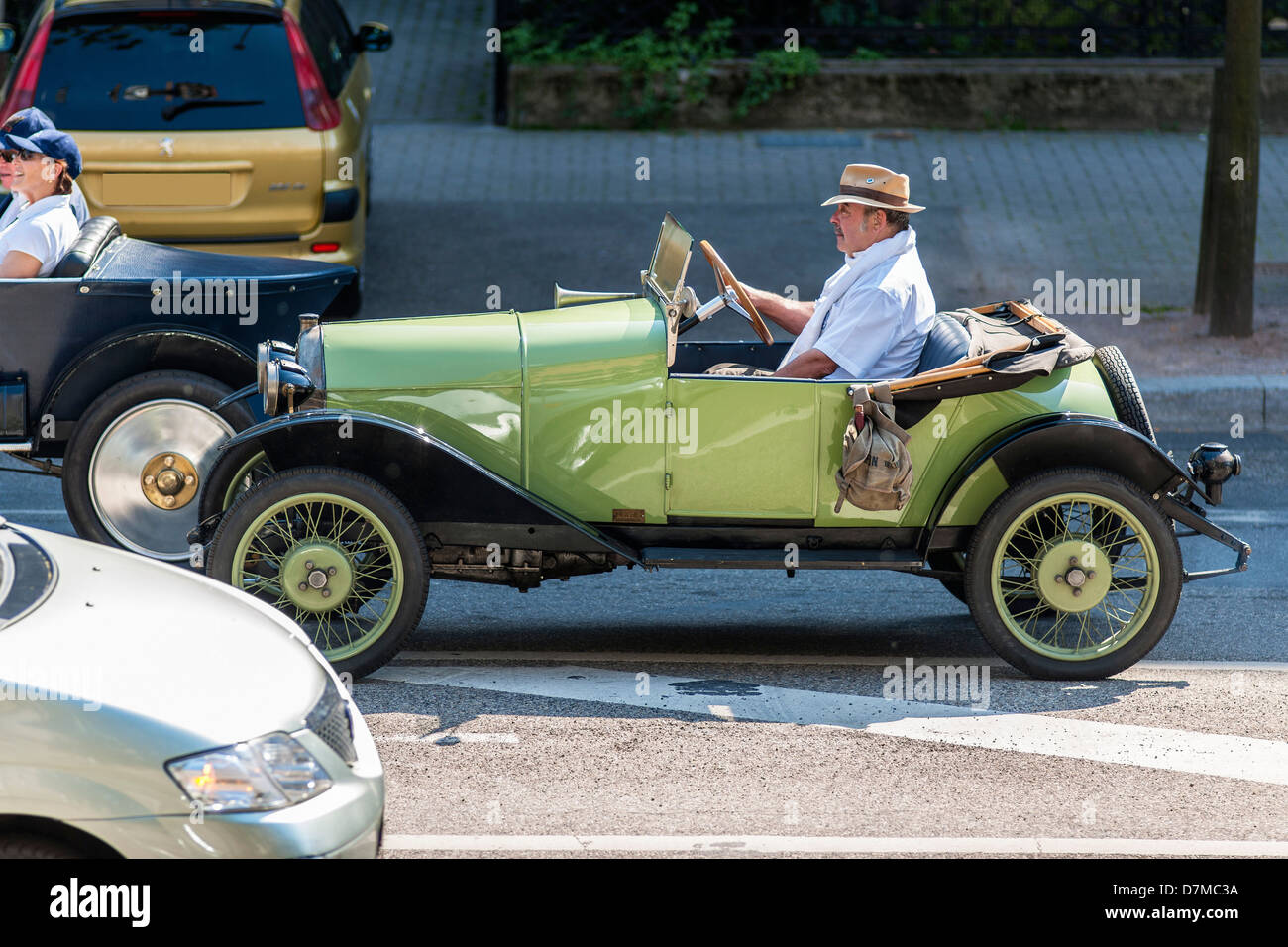 Man driving a 1921 convertible Mathis Torpedo P French vintage car ...