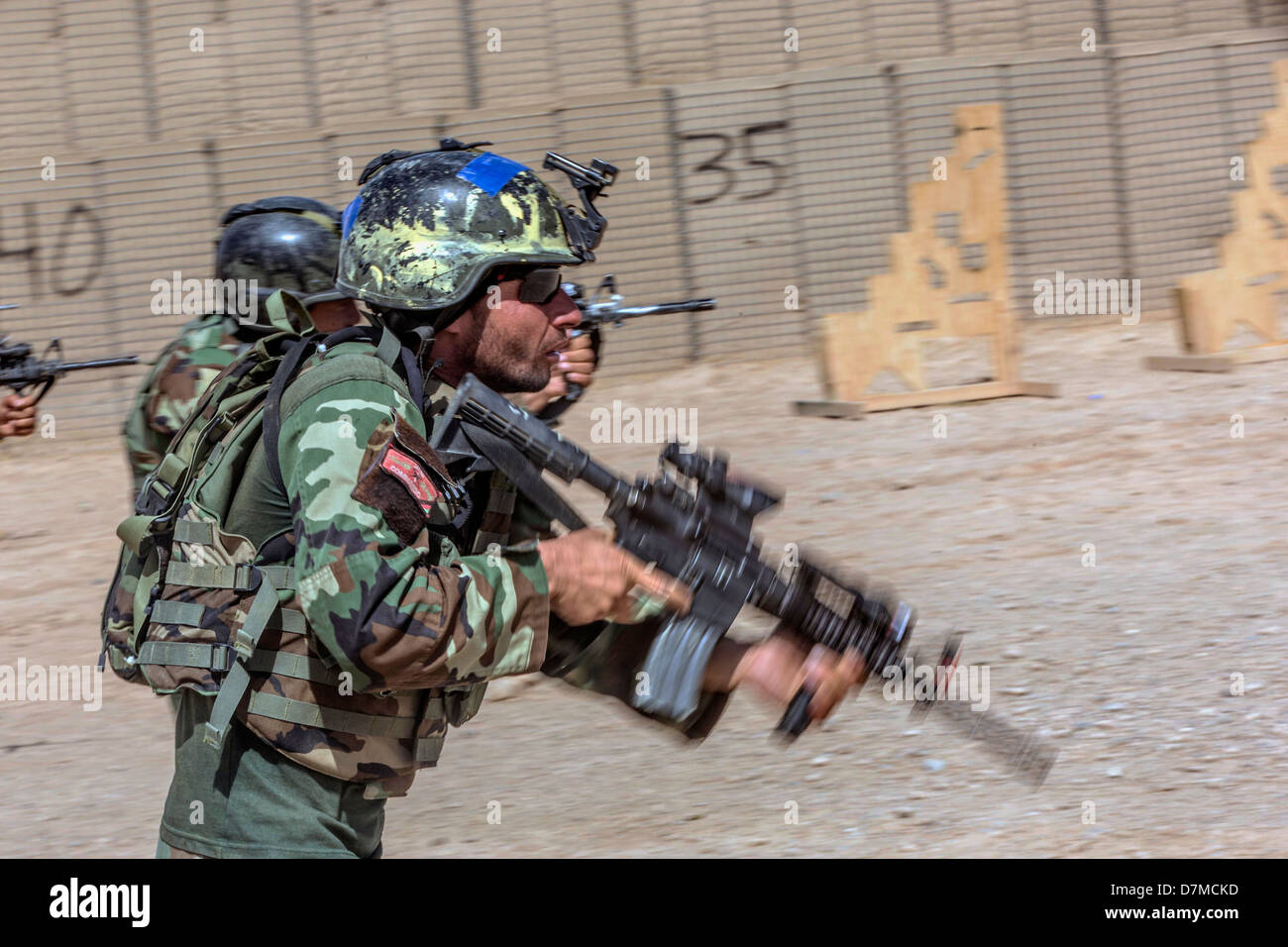 Afghan commandos from Special Operations Kandak fire their weapons at a ...