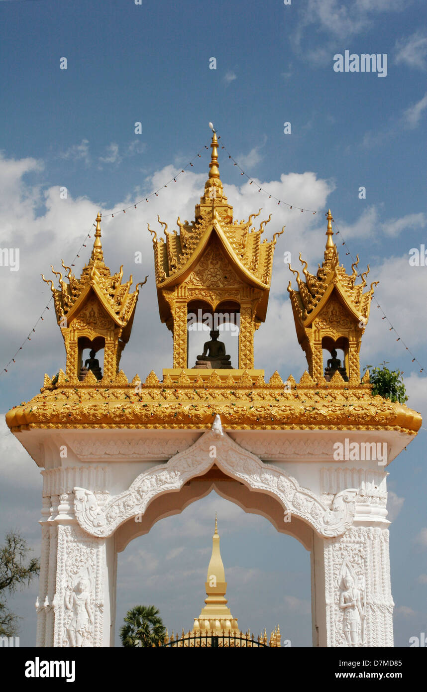 The entrance gate to Pha That Luang Stock Photo - Alamy