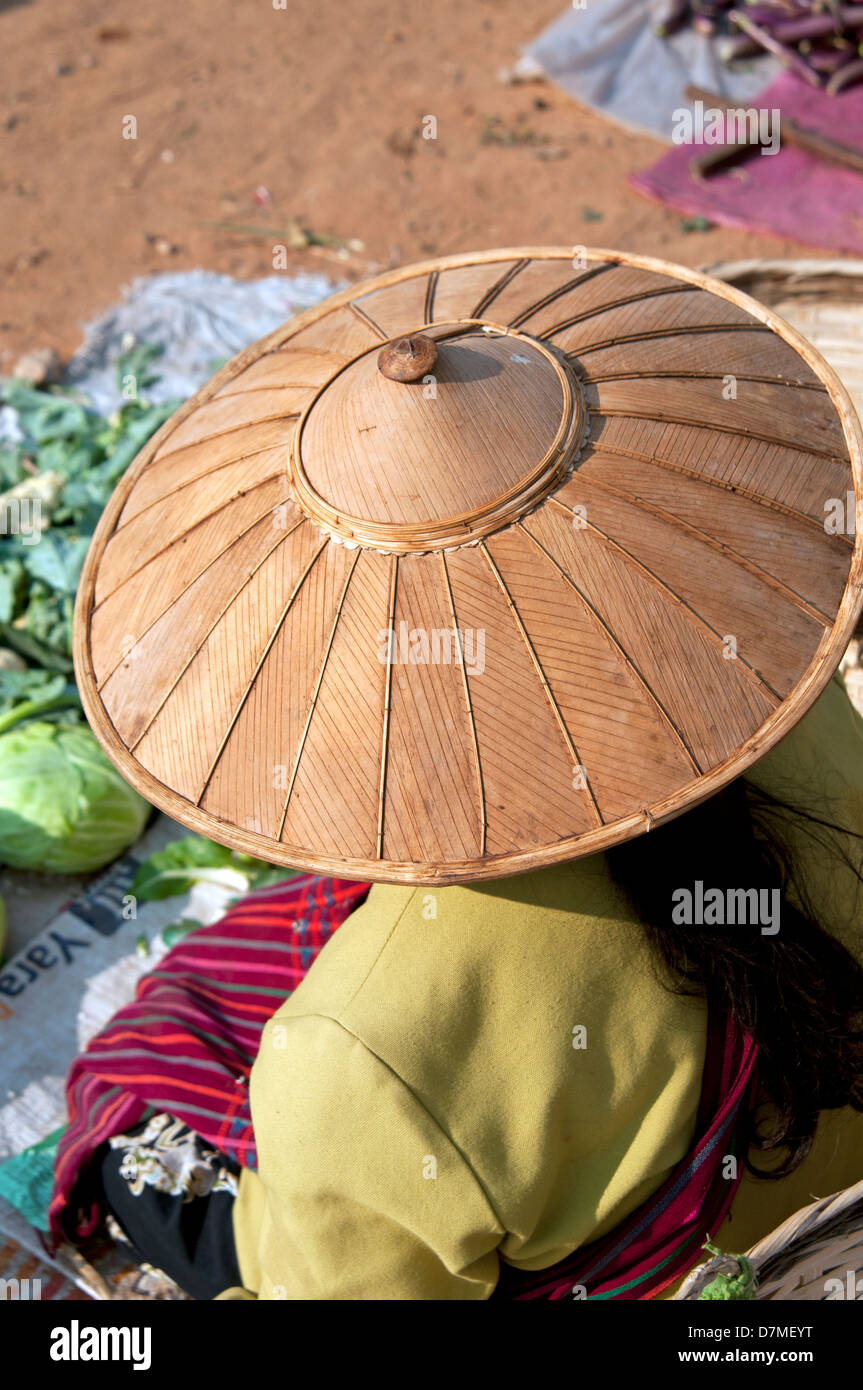 Close up of traditional Shan states bamboo hat worn by market trader ...