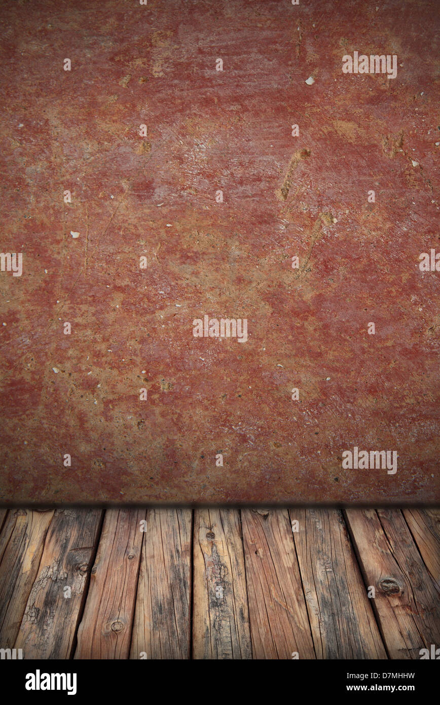 an old room with a wooden floor and a damage wall Stock Photo - Alamy