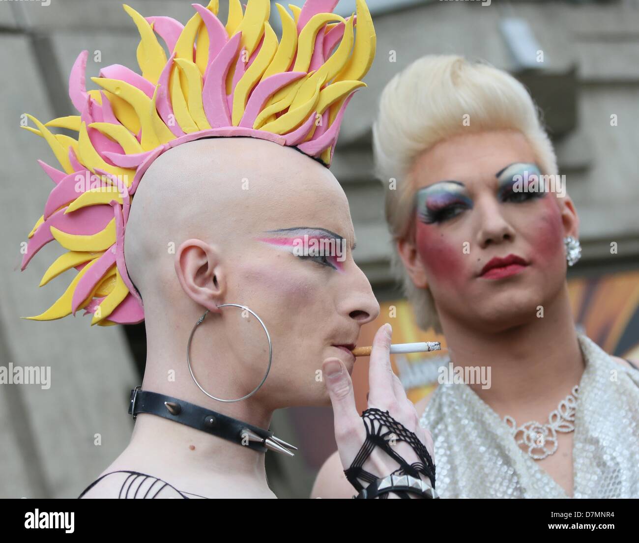 Two Men Dressed As Women Await The Start Of The Casting Session Outside