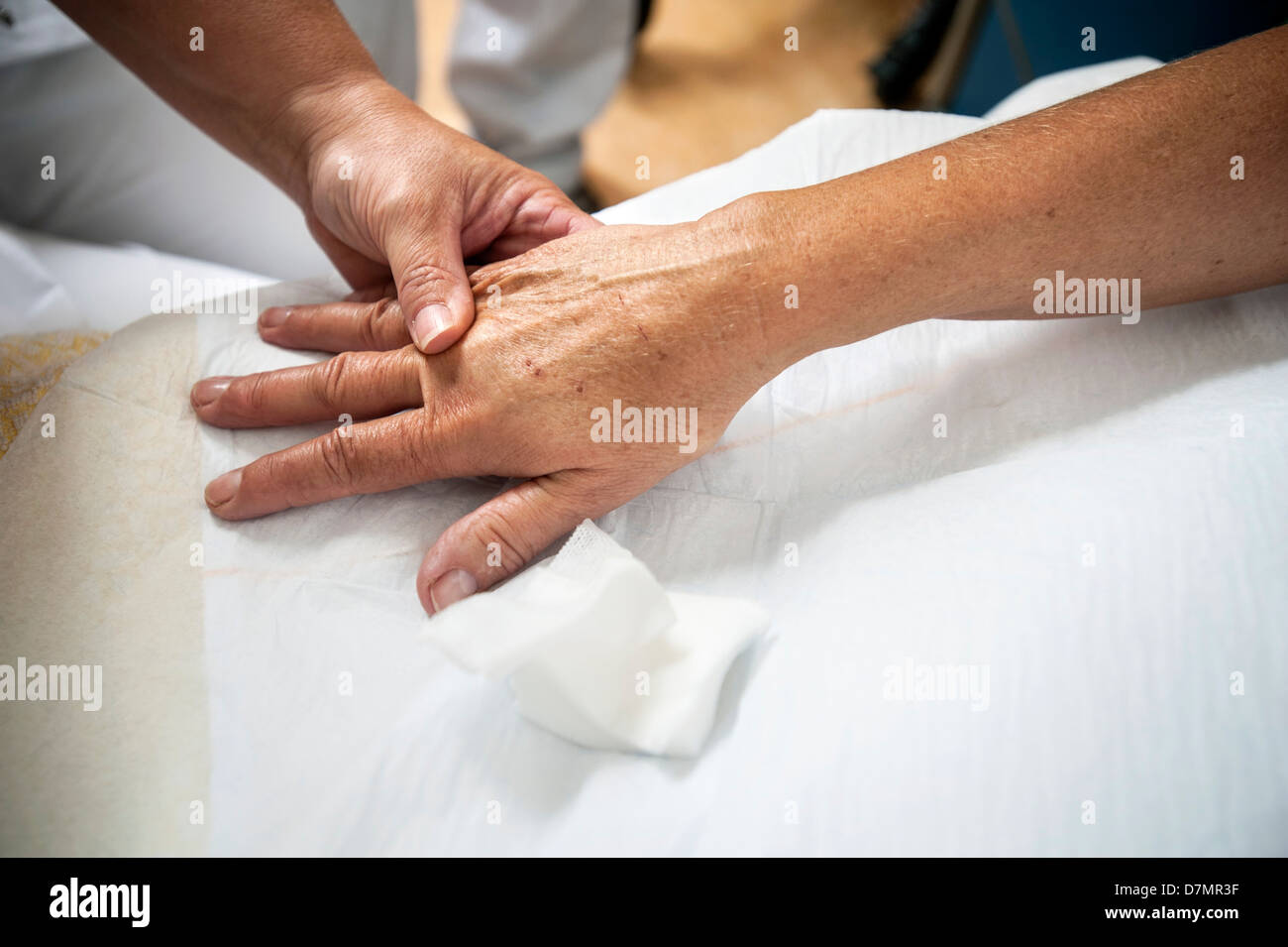 Nurse preparing a patient for an IV line Stock Photo - Alamy