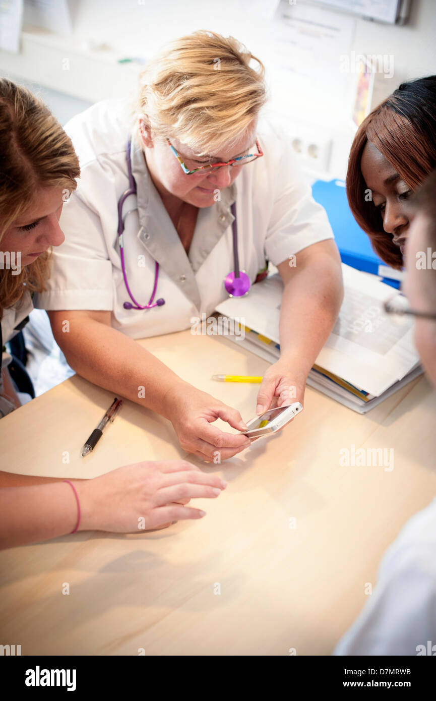 Hospital nursing meeting Stock Photo - Alamy