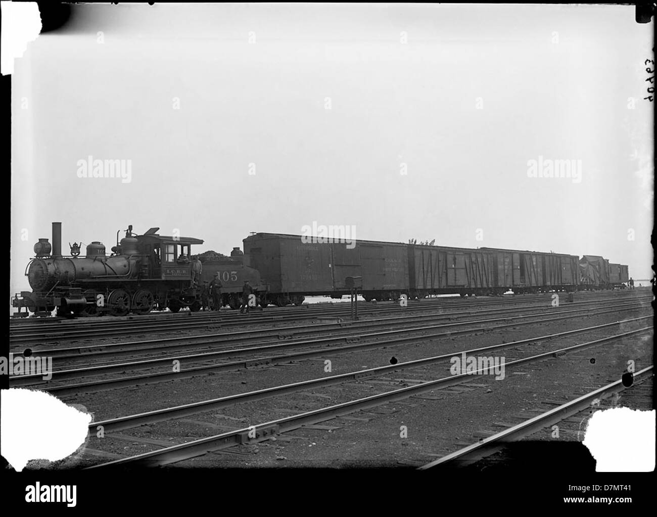 An image showing a train moving along railroad tracks, captured as part ...