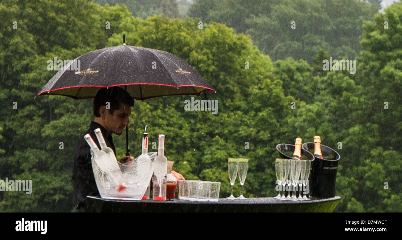 Outside bar with waiter serving champagne and vodka Stock Photo - Alamy
