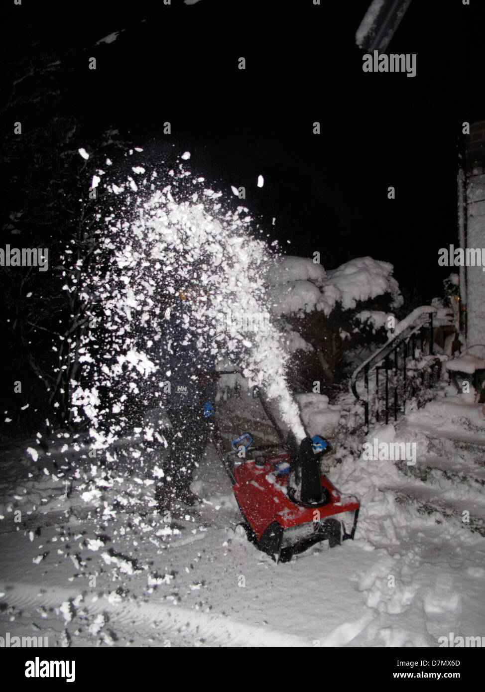snow blower, snow thrower at work Stock Photo - Alamy