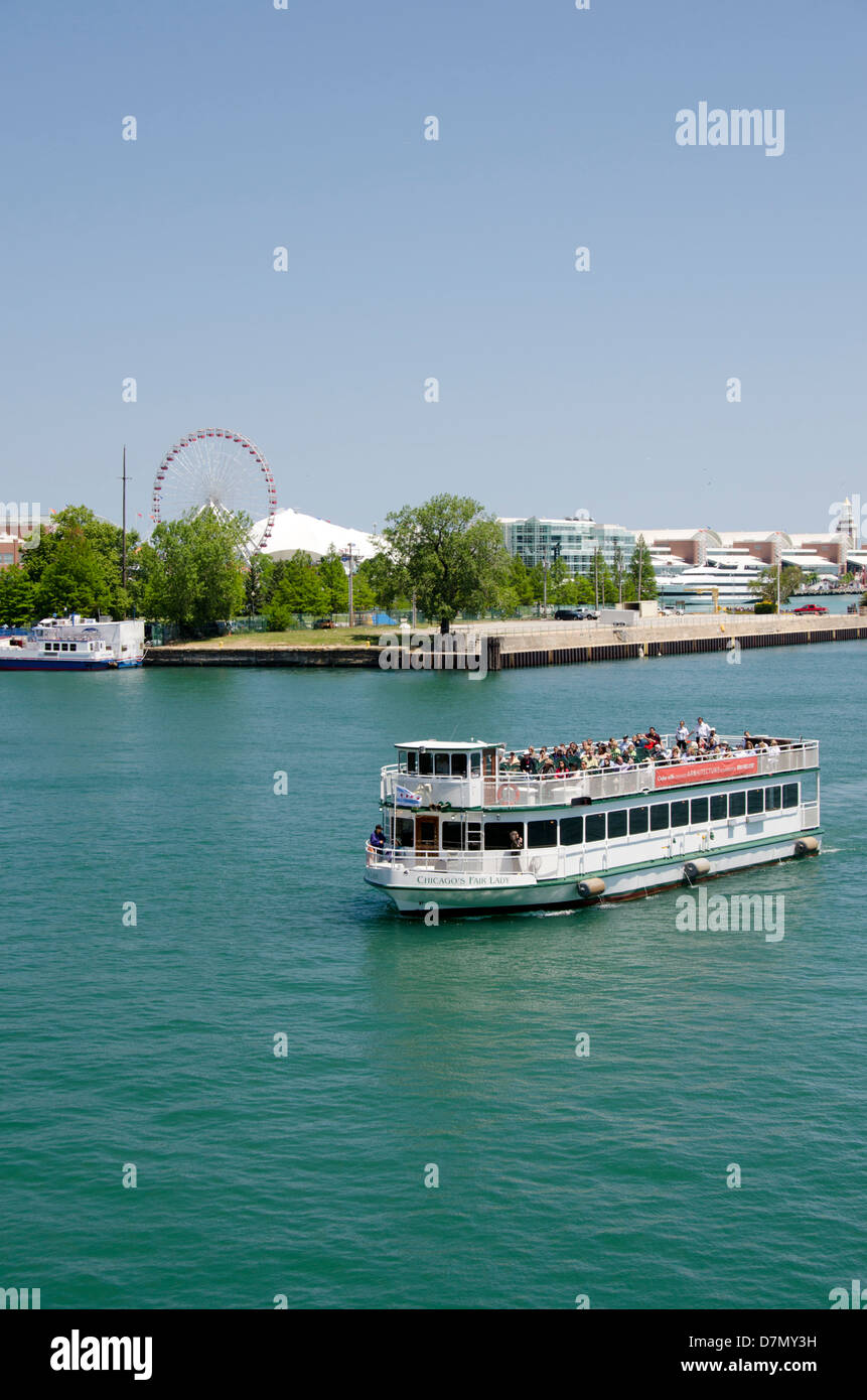 Illinois, Chicago. Sightseeing tour boat in front of Navy Pier along ...