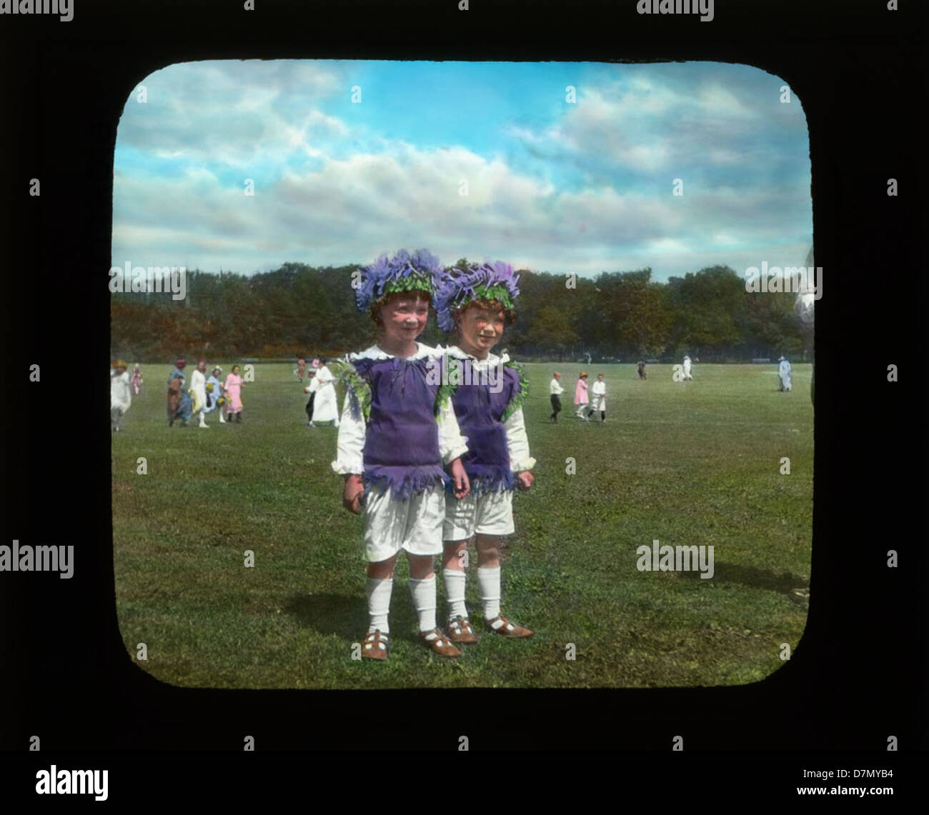 Boys in flower costumes Stock Photo - Alamy