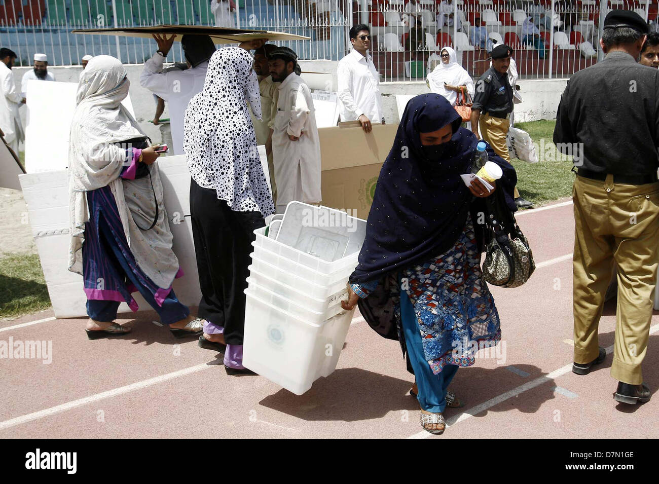 Election Presiding officials receiving ballot boxes and ballot papers ...