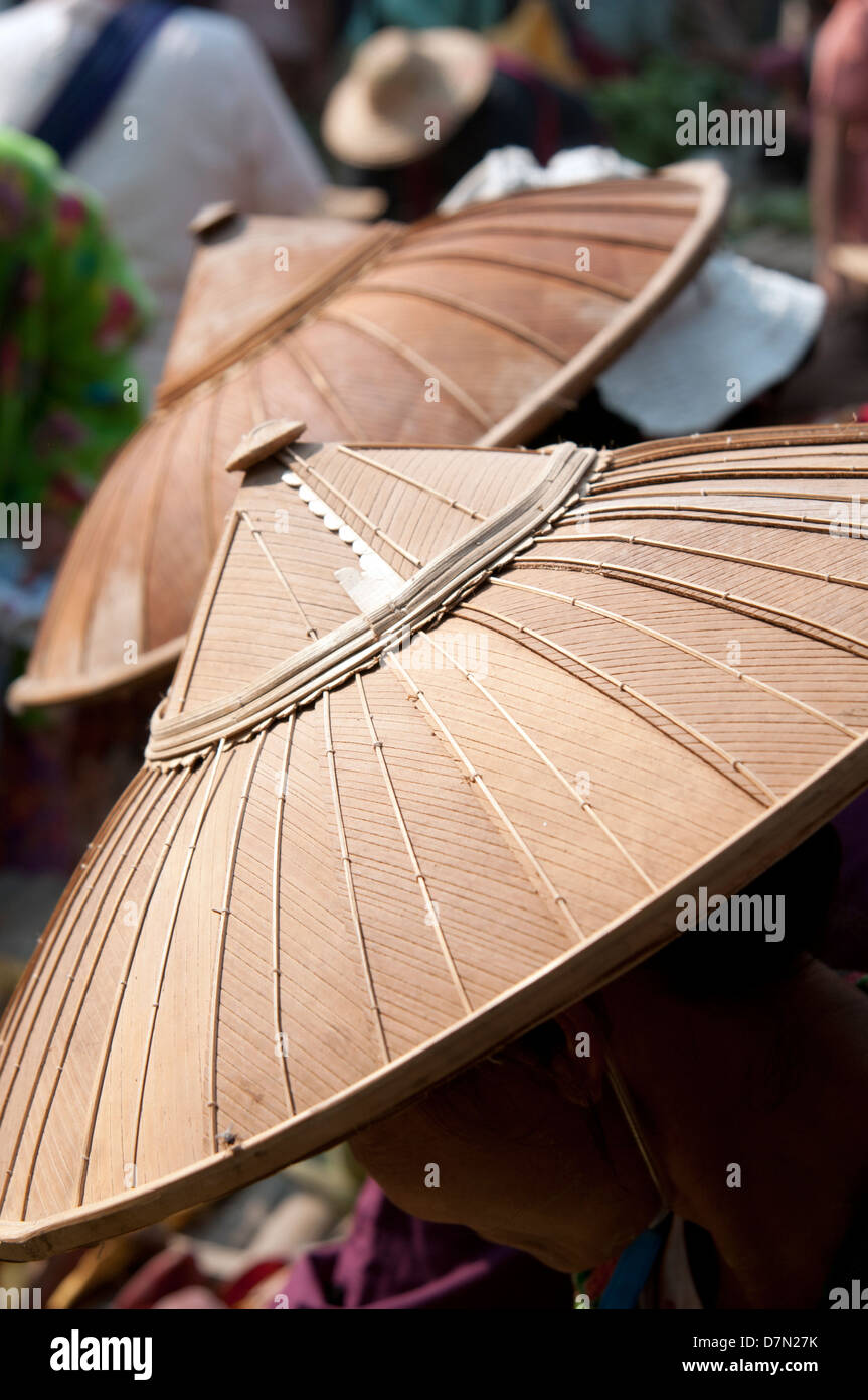 Close up of two traditional Shan states bamboo hats worn by market ...